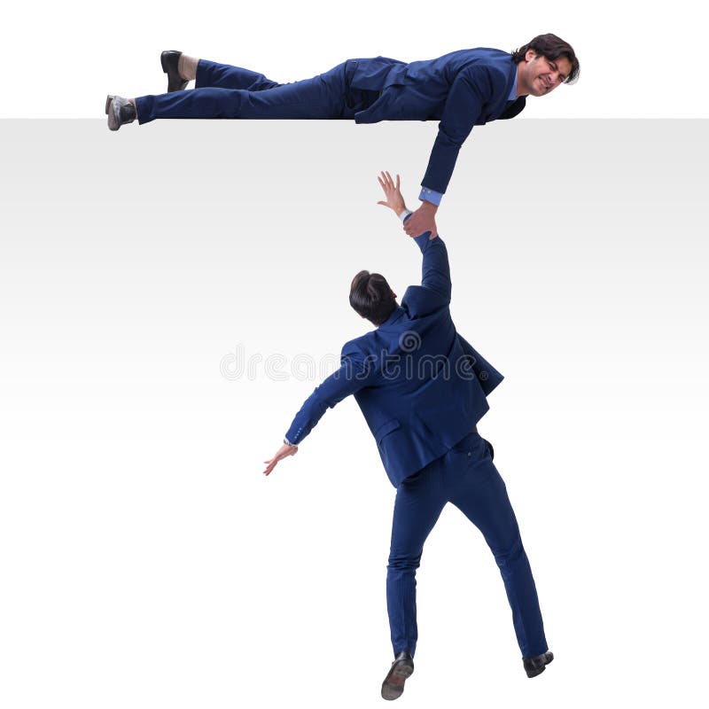 The Businessman Offering Helping Hand To Falling Colleague Stock Photo ...