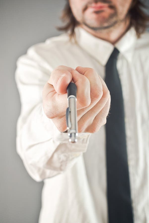 Businessman Offering Pencil for Contract Signing Stock Image - Image of ...