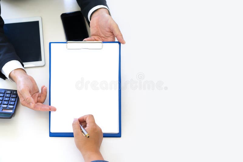 Businessman Offers a Empty Document on Clipboard and Pointing at the ...