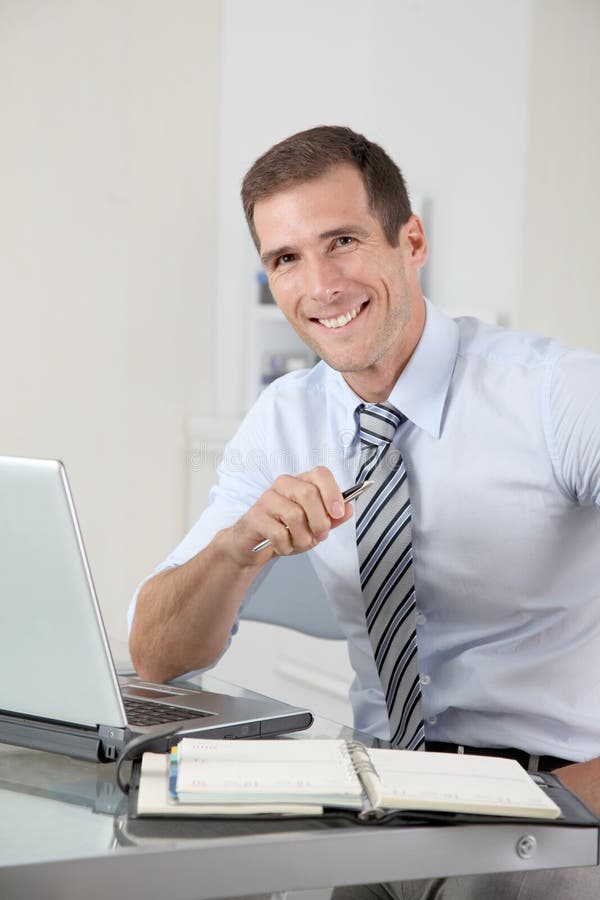Businessman in the office stock image. Image of sitting - 16577951