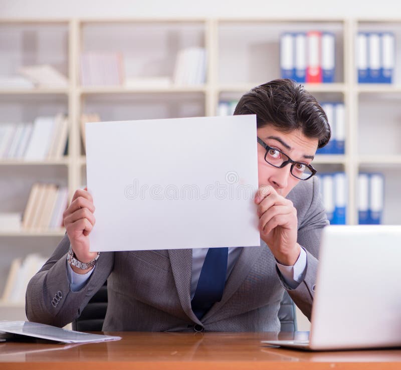 Businessman in Office Holding a Blank Message Board Stock Photo - Image ...