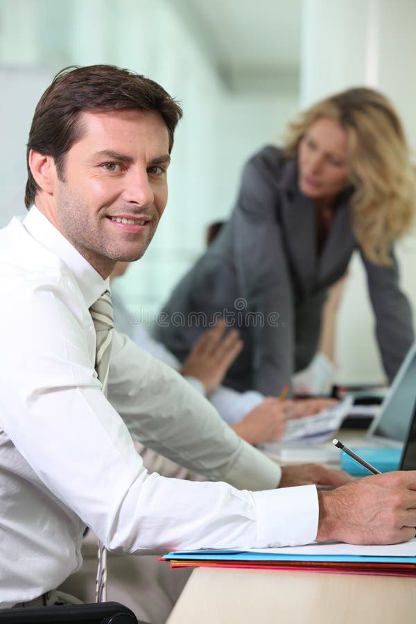 Businessman in an Office Meeting Stock Image - Image of partners ...