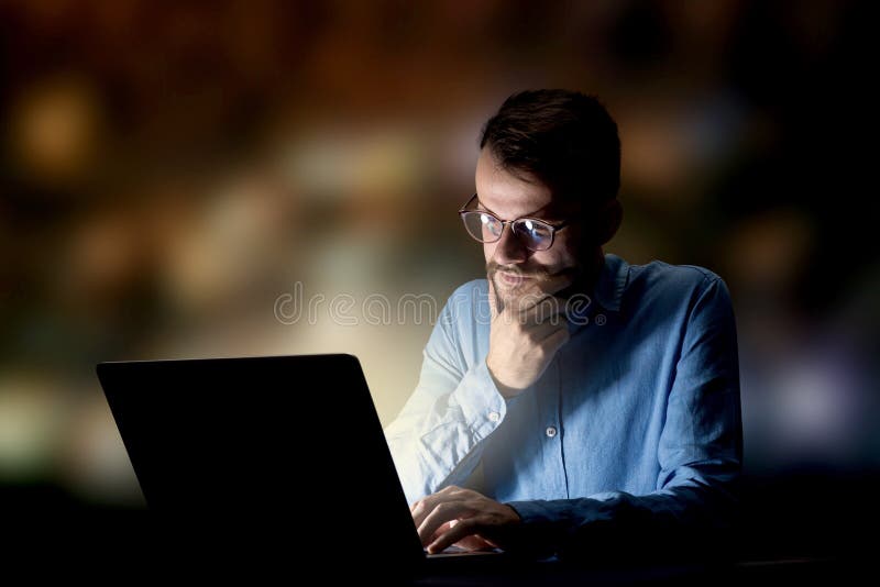 Businessman in the Office at Night Stock Image - Image of laptop ...