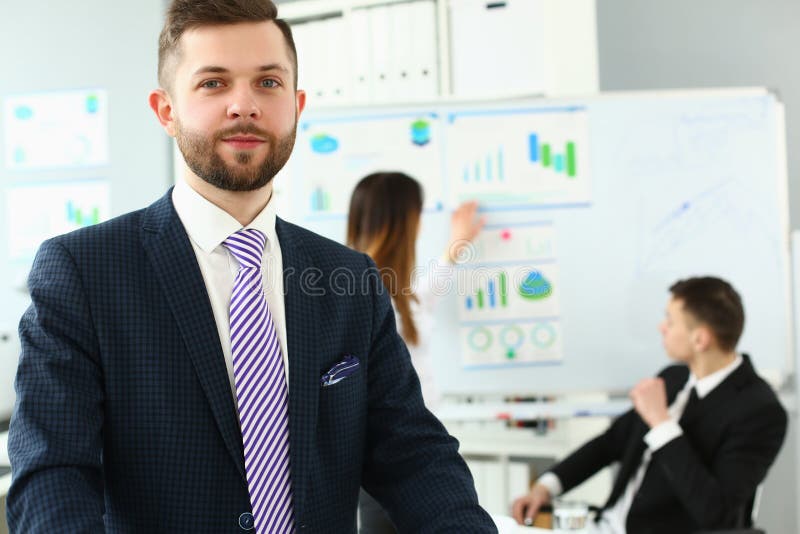 Businessman in Office in Presentable Suit, Colleagues Discussing ...