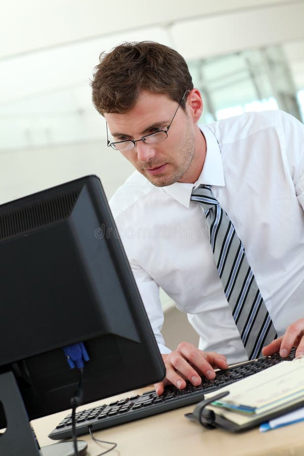 Businessman at Office Working on Computer Stock Image - Image of ...