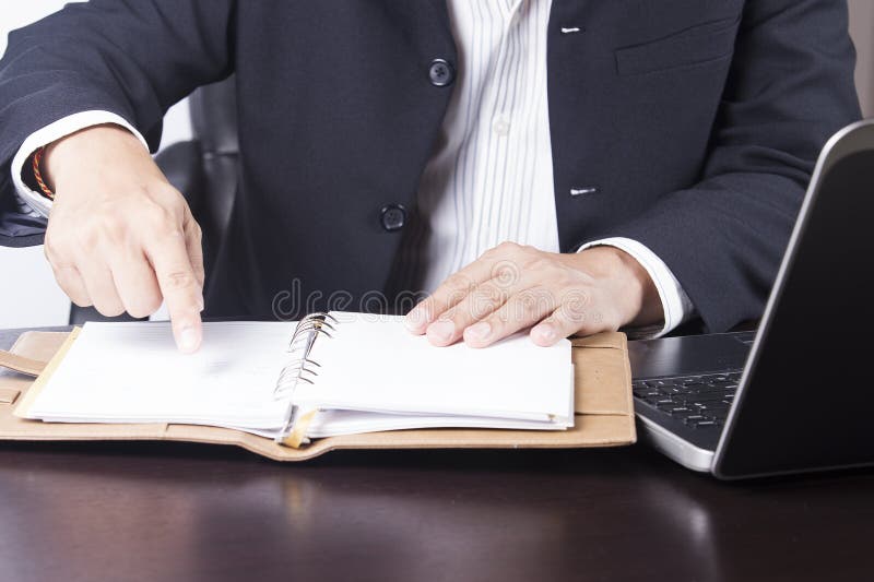 Businessman Opening His Notebook Stock Image - Image of businessperson ...