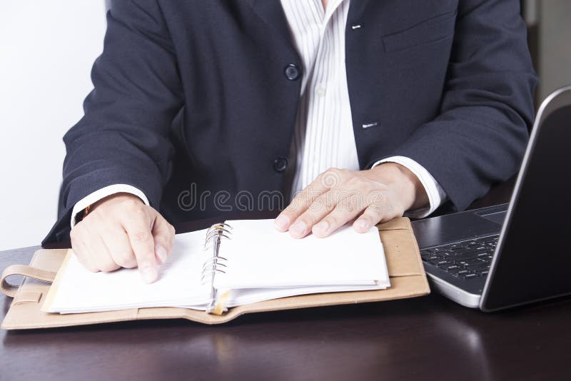 Businessman Opening His Notebook Stock Image - Image of businessman ...