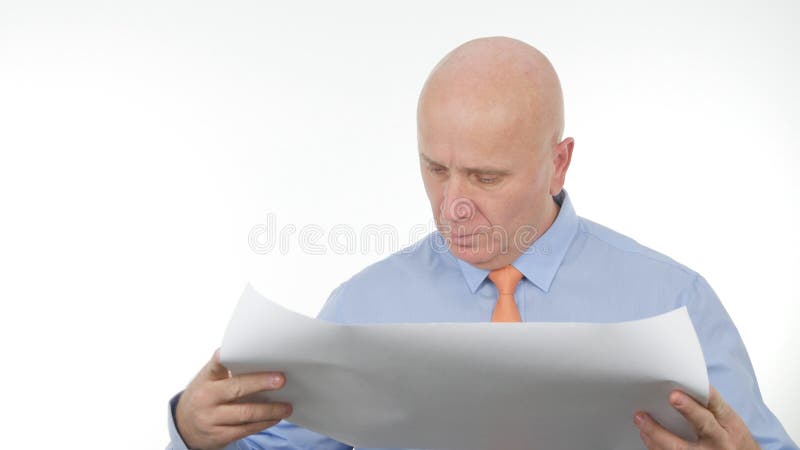 Businessman Opening and Reading a Building Project Stock Photo - Image ...