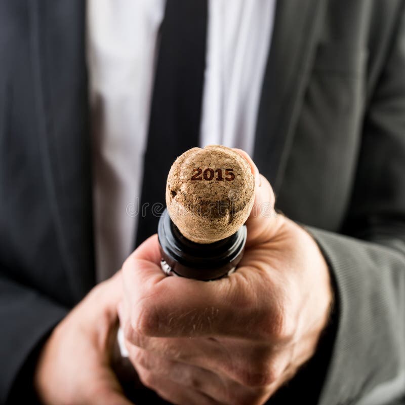 Businessman Opening Wine Bottle with Cork Stock Photo - Image of ...