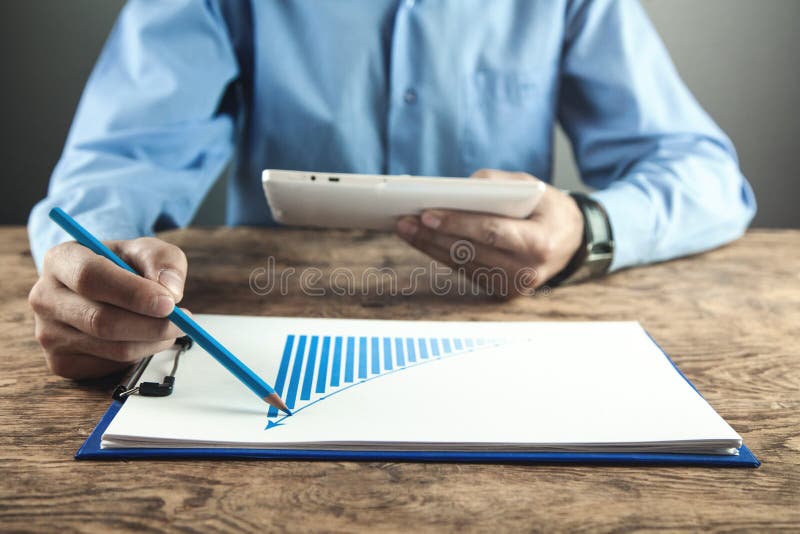 Businessman with Pencil Drawing Business Chart Stock Photo - Image of ...