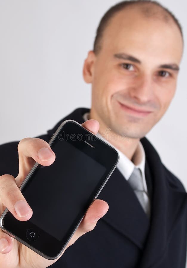 Businessman with phone stock image. Image of handsome - 11266595