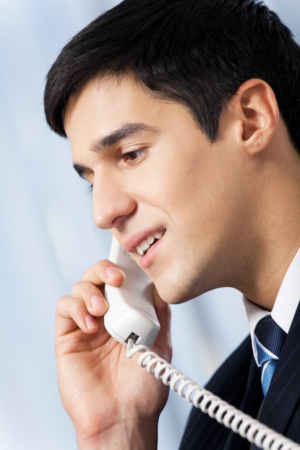 Businessman with phone stock image. Image of corporate - 20697943