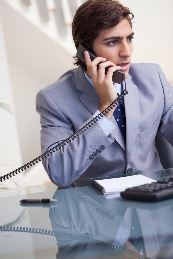 Businessman on the phone stock photo. Image of corporate - 22349722