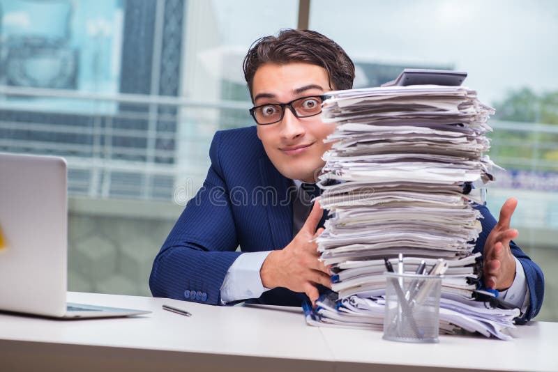 The Businessman with Pile Stack of Paper Paperwork in the Office Stock ...