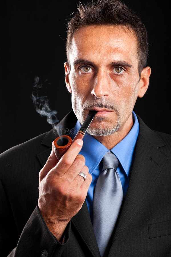 Businessman with pipe stock image. Image of successful - 26612765