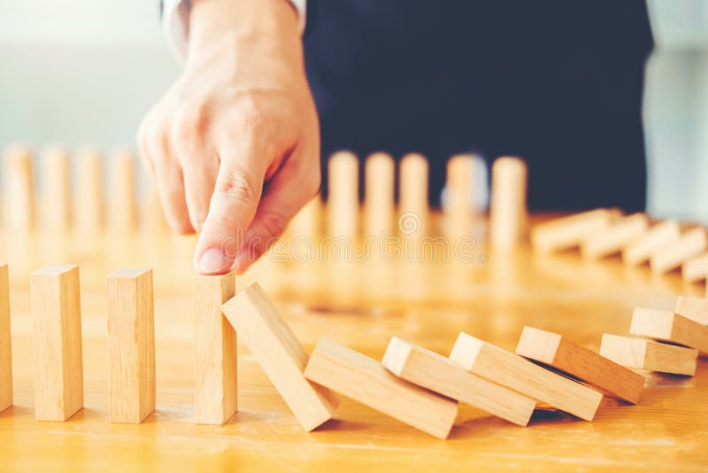 Businessman Plan and Strategy in Business Domino Effect Problem Solving ...