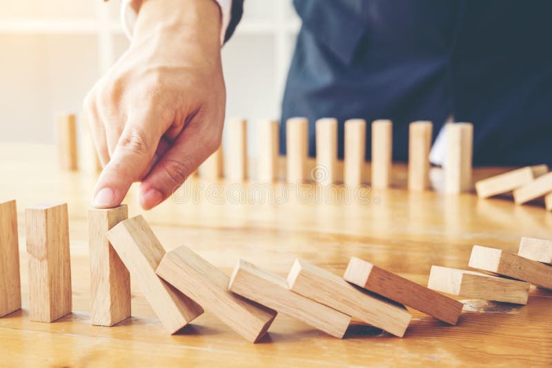 Businessman Plan and Strategy in Business Domino Effect Problem Solving ...