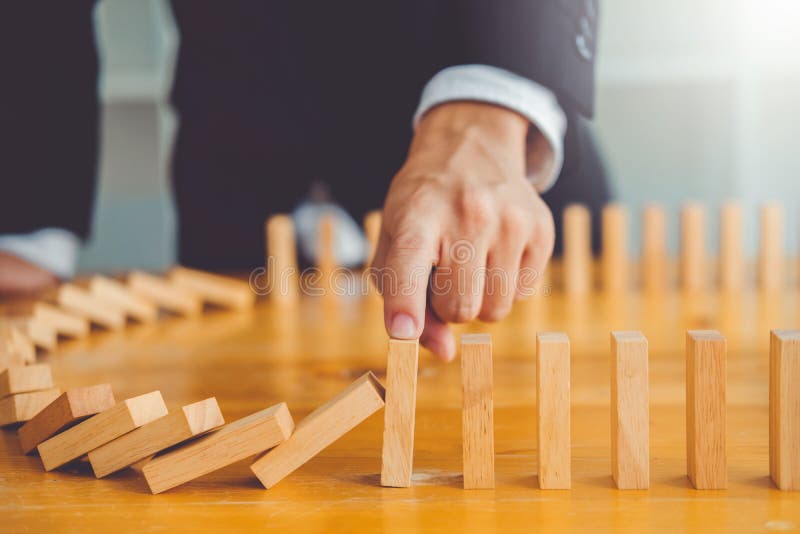 Businessman Plan and Strategy in Business Domino Effect Problem Solving ...