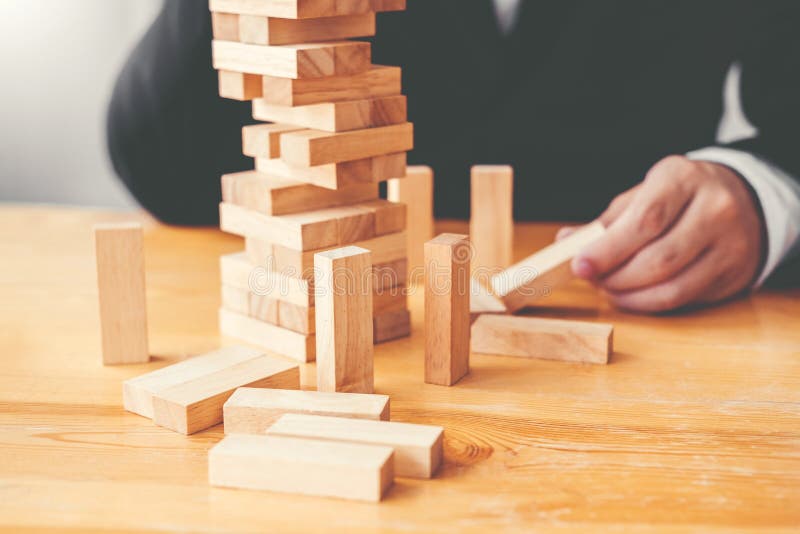 Businessman Plan and Strategy in Business Domino Effect Problem Solving ...