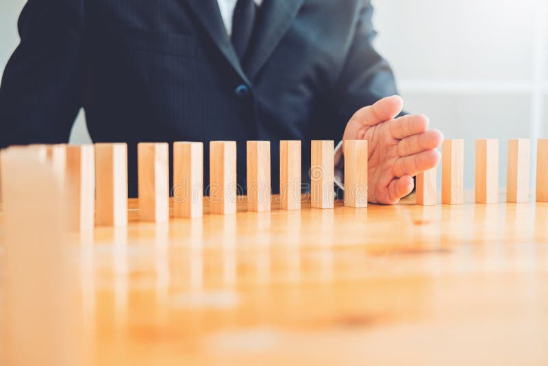 Businessman Plan and Strategy in Business Domino Effect Problem Solving ...