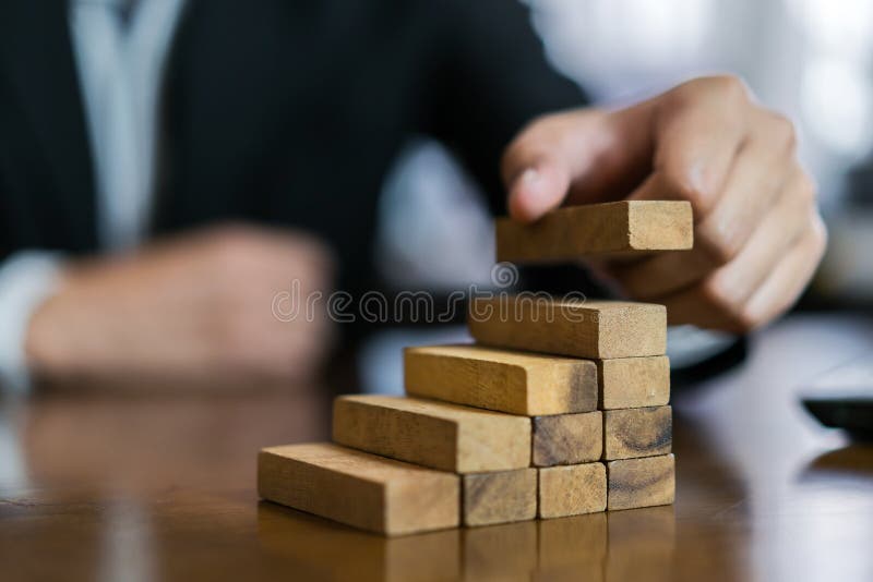 Businessman Planing and Strategy Putting Wooden Blocks Risk or Success ...