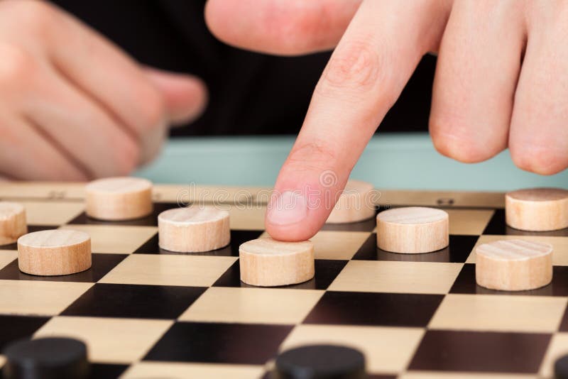 People Are Playing Checkers Close-up, The Concept Of A Board Game Stock ...