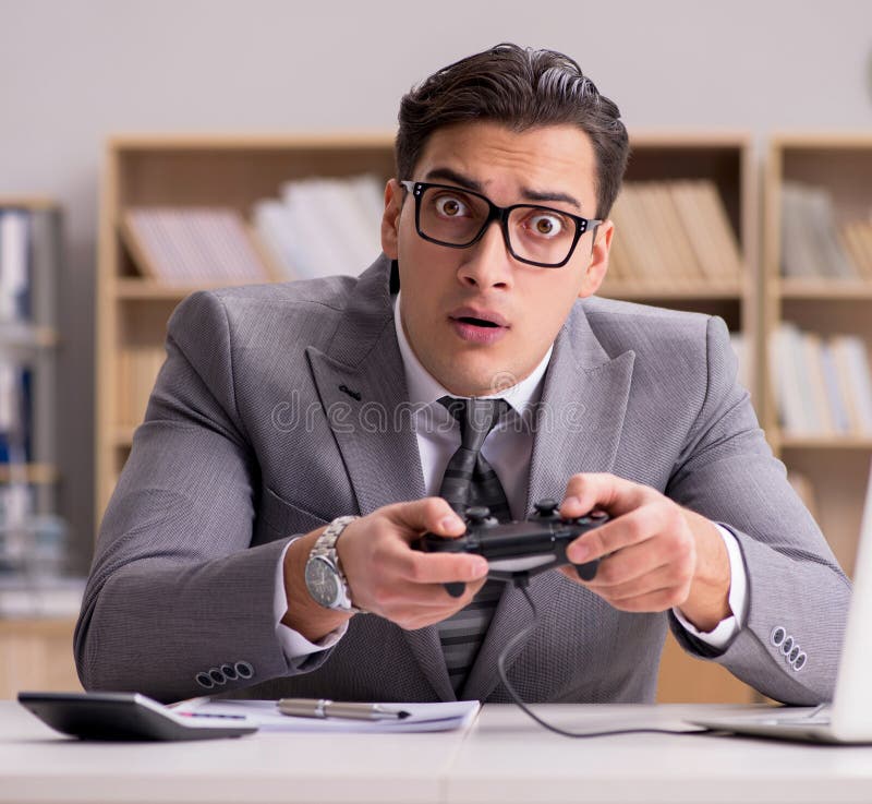 The Businessman Playing Computer Games at Work Office Stock Photo ...