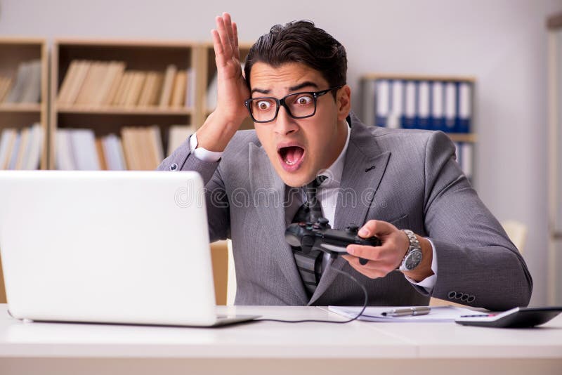 The Businessman Playing Computer Games at Work Office Stock Image ...