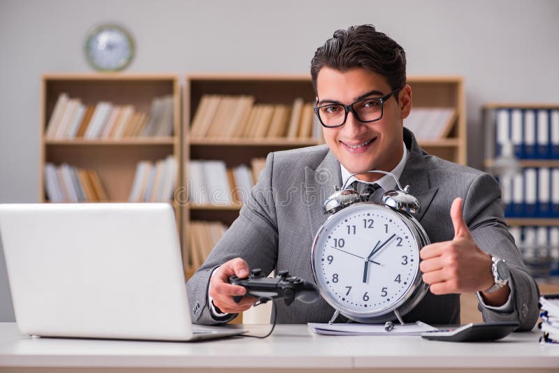 The Businessman Playing Computer Games at Work Office Stock Photo ...