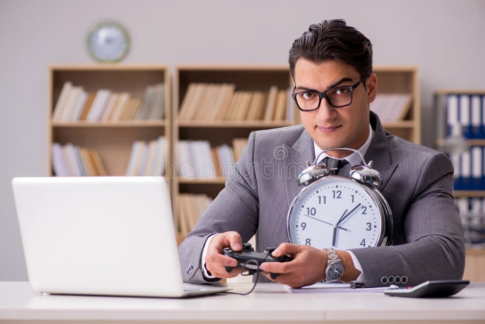 The Businessman Playing Computer Games at Work Office Stock Photo ...