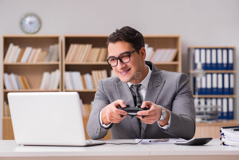 The Businessman Playing Computer Games at Work Office Stock Photo ...