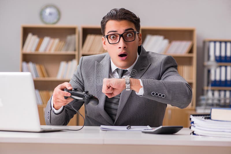 The Businessman Playing Computer Games at Work Office Stock Photo ...