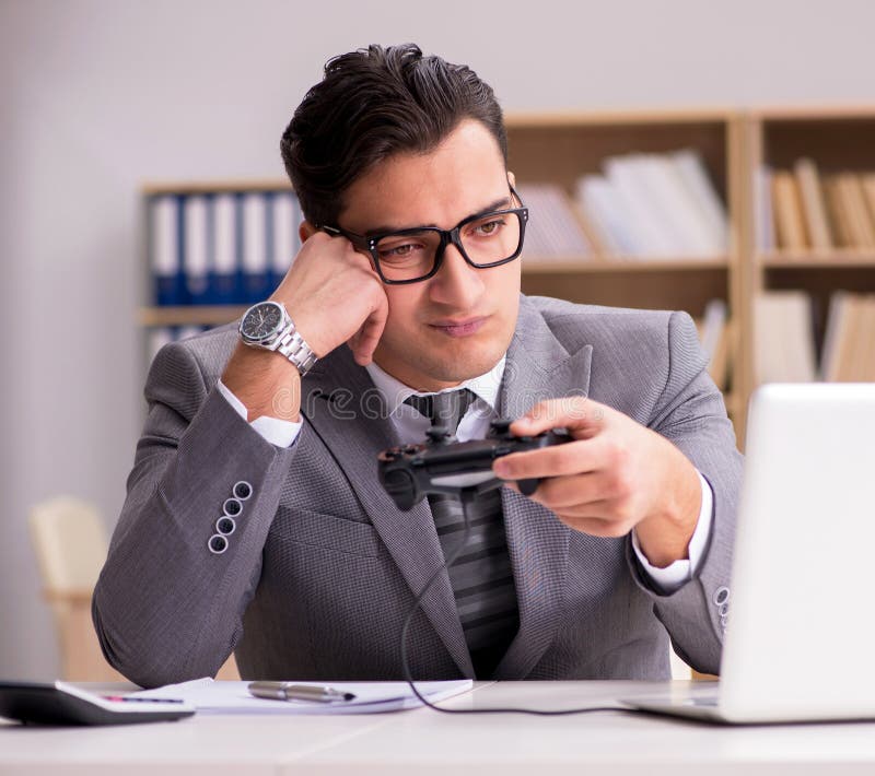 Businessman Playing Computer Games at Work Office Stock Image - Image ...