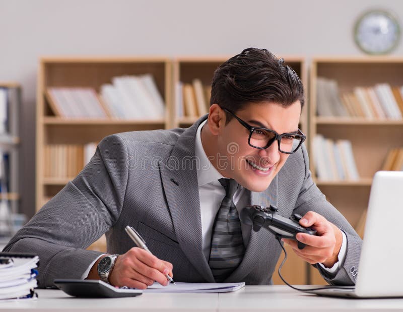 Businessman Playing Computer Games at Work Office Stock Photo - Image ...