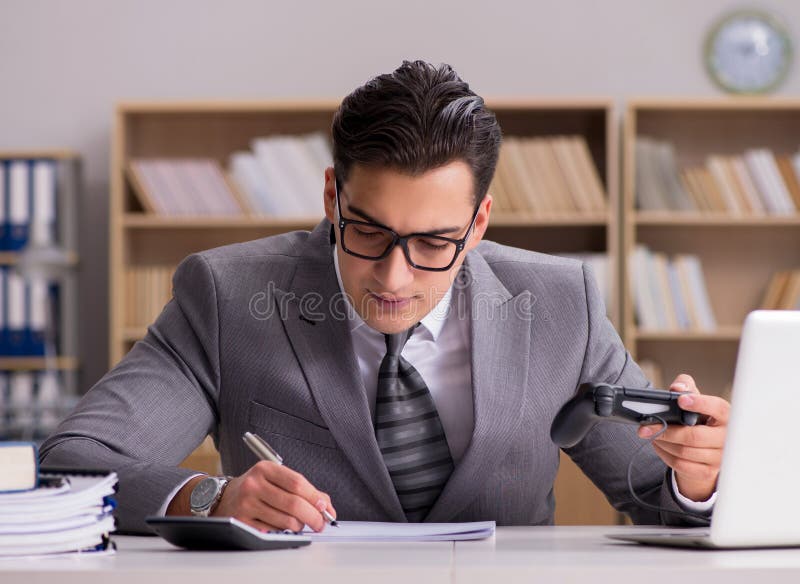 Businessman Playing Computer Games at Work Office Stock Image - Image ...