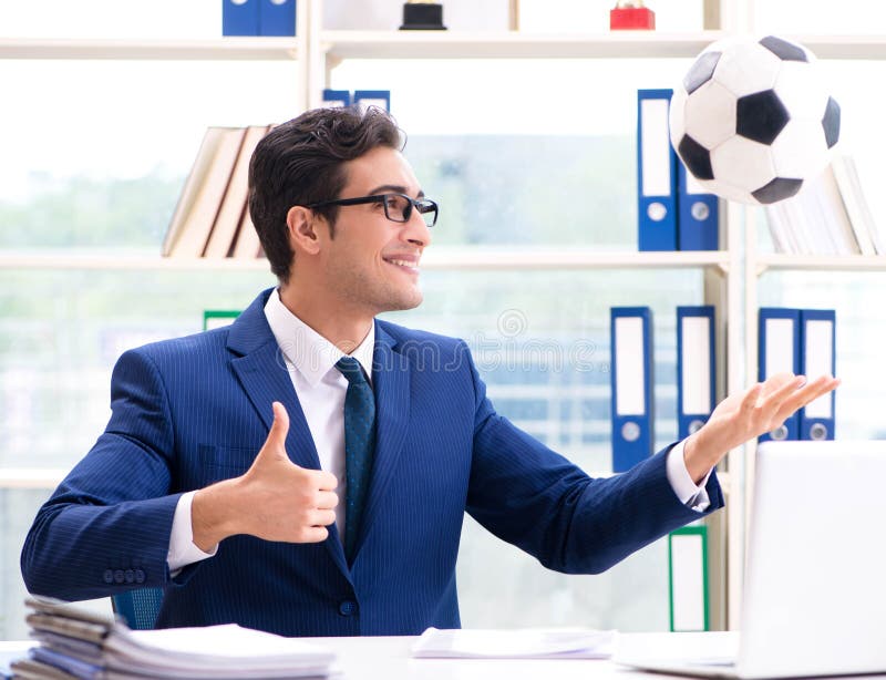 Businessman Playing Football in the Office Stock Image - Image of ...