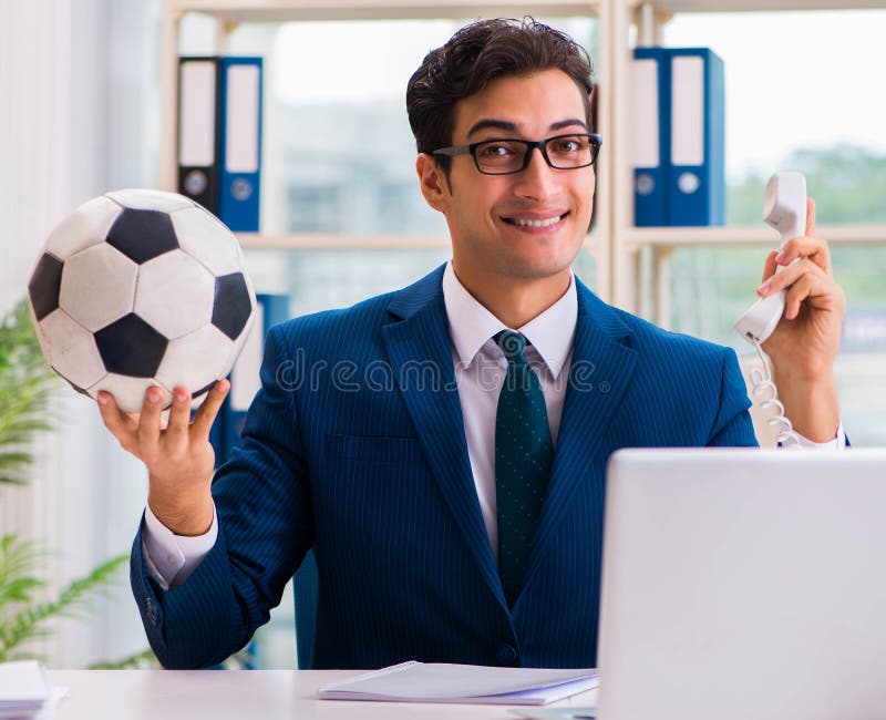 Businessman Playing Football in the Office Stock Image - Image of ...