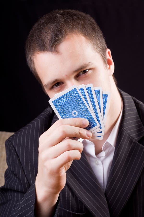 Businessman playing poker stock image. Image of closeup - 28418895