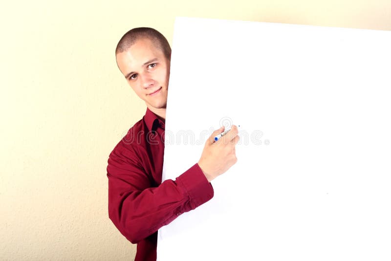 Businessman point at table stock photo. Image of handsome - 10250156