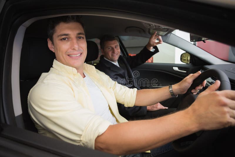 Businessman Pointing a Car Interior Stock Photo - Image of people ...