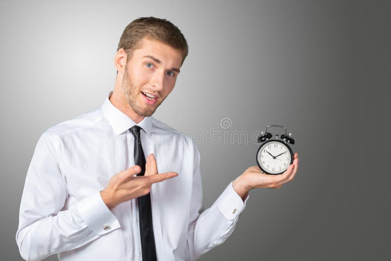 Businessman Pointing at Clock Stock Photo - Image of happy, business ...