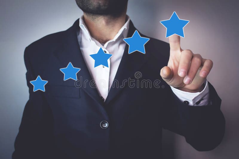Businessman Pointing Five Star To Increase Rating. Evaluation an Stock ... Businessman Pointing Five Star To Increase Rating. Evaluation an Stock ...