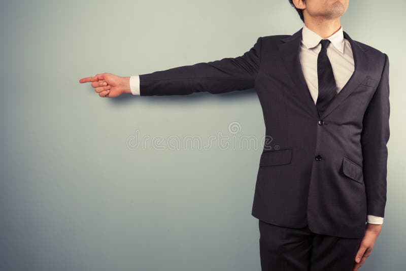 Pointing To the Left. Man in Suit Stock Photo - Image of blank ...