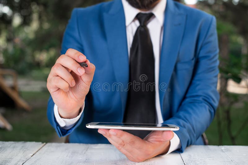 Businessman Pointing with Pen in Empty Copy Space. Business Concept ...