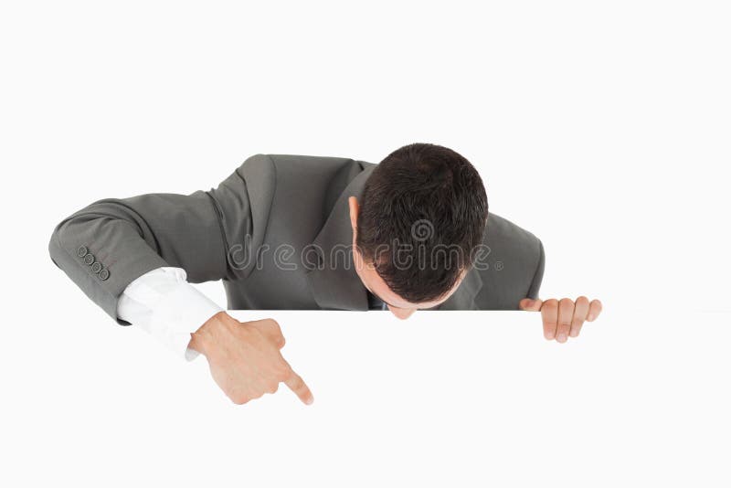 Businessman Pointing on Sign Below Him Stock Image - Image of billboard ...