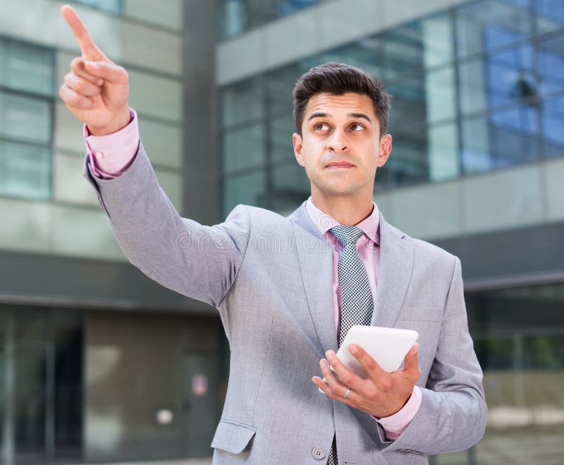Businessman Pointing at Something Stock Image - Image of business ...