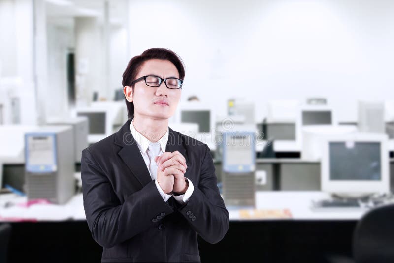 Businessman pray at office stock photo. Image of career - 32978032