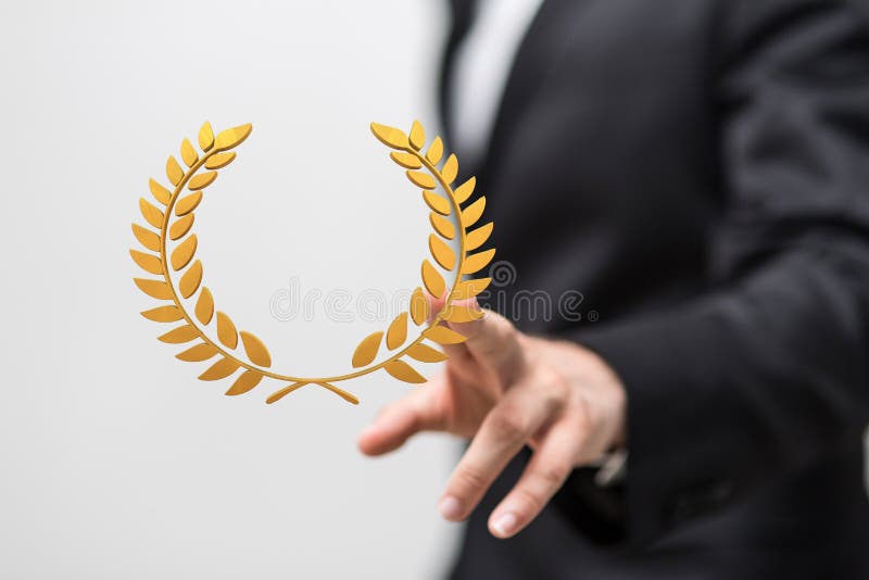 Businessman Presenting a 3D Render of Golden Prize Symbol Stock Image ...