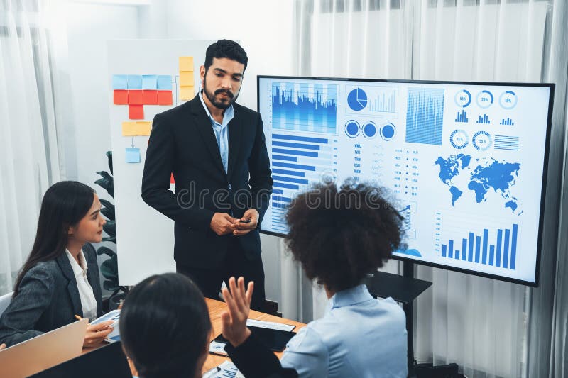 Businessman Presenting Data Analysis Dashboard on TV at Meeting Room ... Businessman Presenting Data Analysis Dashboard on TV at Meeting Room ...