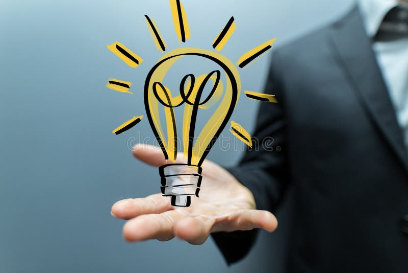 Businessman Presenting a Virtual Projection of a Creative Idea Lamp ...